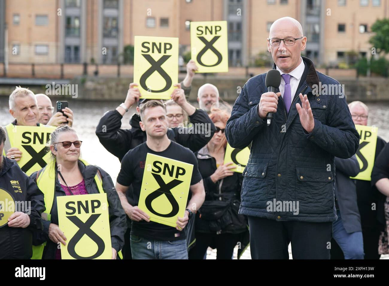 Scottish First Minister and SNP leader John Swinney giving a speech in ...