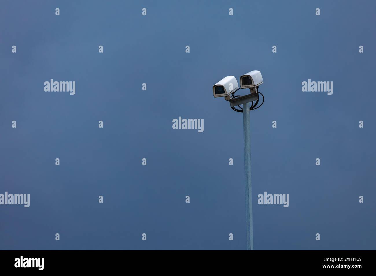 Video monitoring camera installed on the building's facade, protecting ...