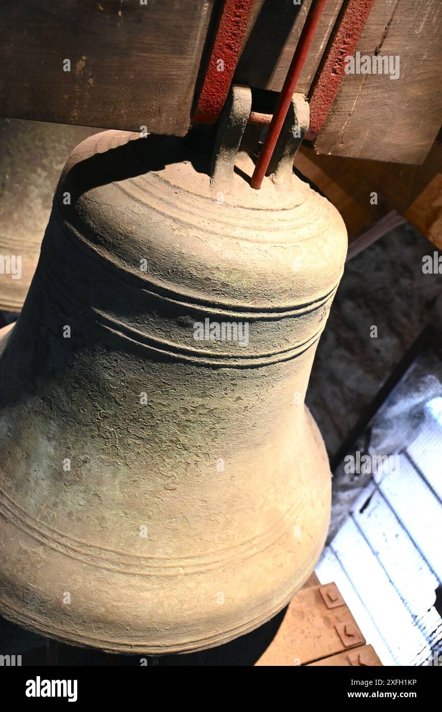 Vertical image of old bell in historical Oxford church tower UK Stock ...