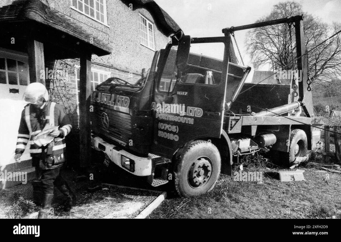 THE DRIVER OF THIS SKIP LORRY WAS KILLED WHEN A TREE WAS BLOWN DOWN ...