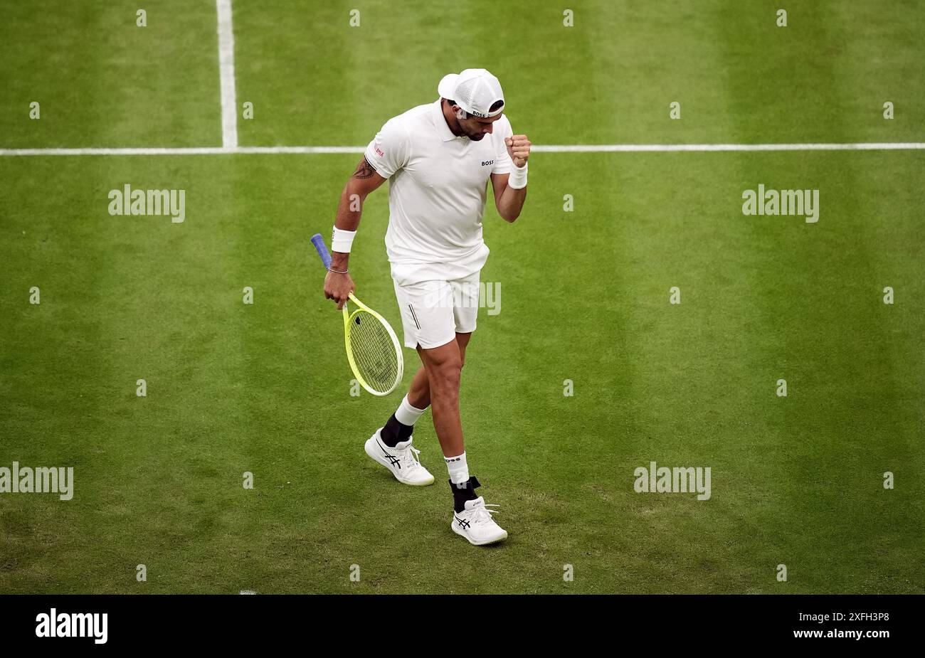 Matteo Berrettini reacts during his match against Jannik Sinner (not pictured) on day three of ...