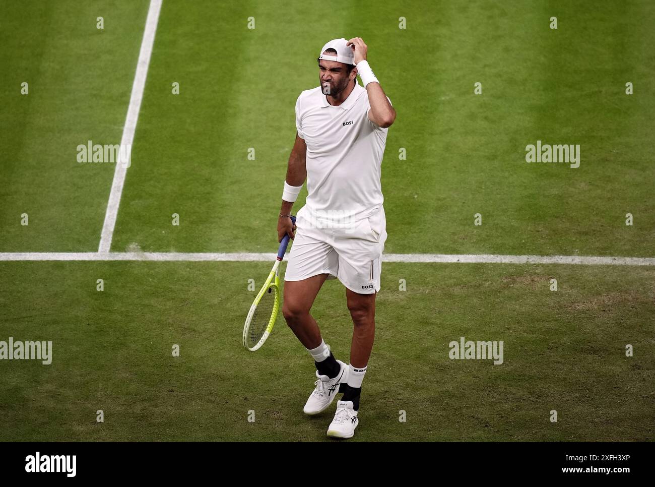 Matteo Berrettini reacts during his match against Jannik Sinner (not pictured) on day three of ...