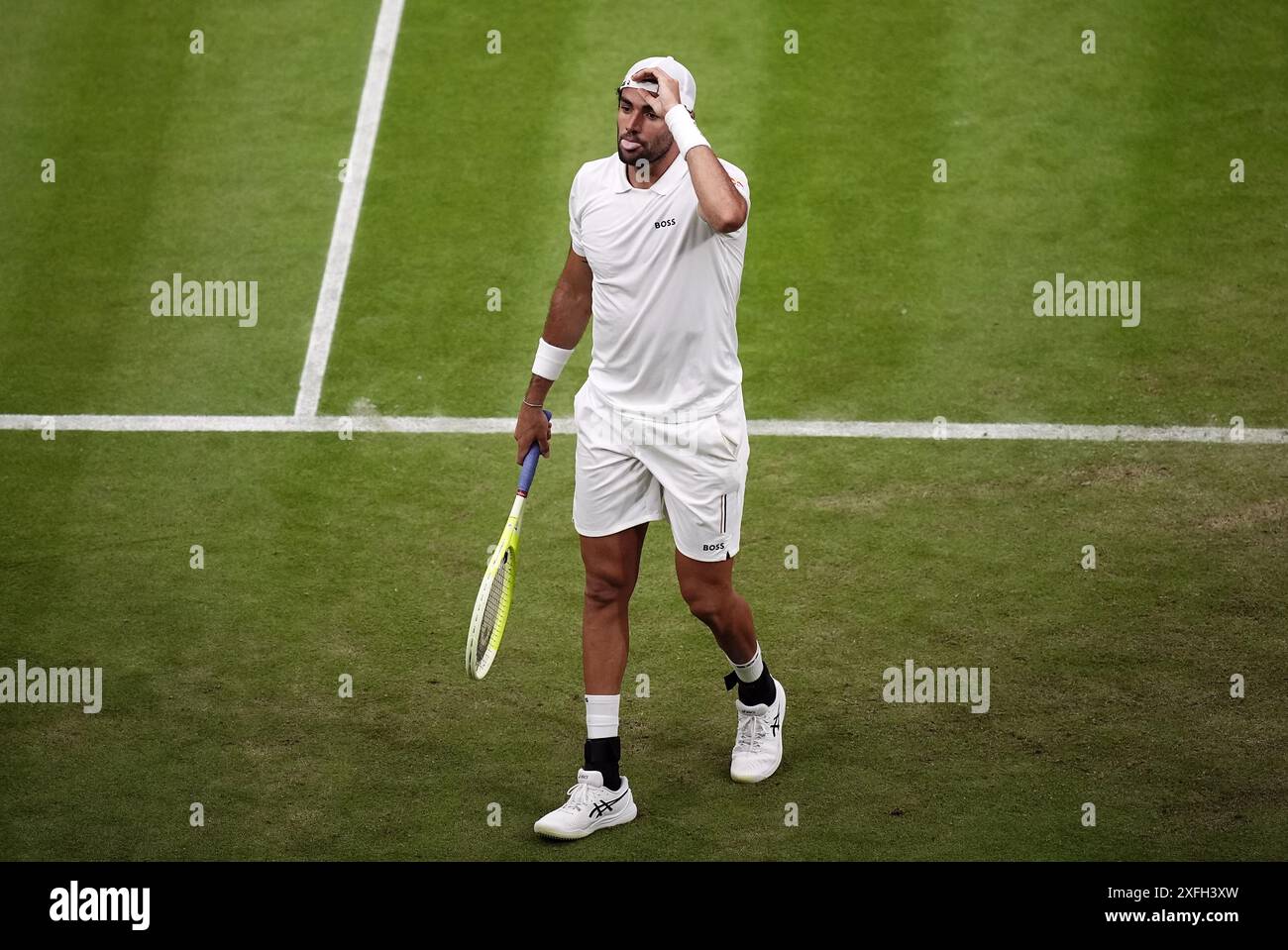 Matteo Berrettini reacts during his match against Jannik Sinner (not pictured) on day three of ...
