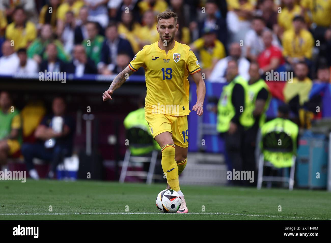 Denis Dragus of Romania in action during the Uefa Euro 2024 round of 16 ...