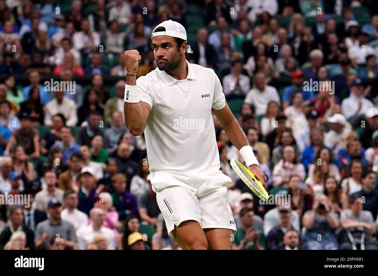 Matteo Berrettini reacts during his match against Jannik Sinner (not pictured) on day three of ...