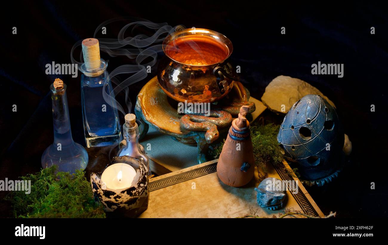 A cauldron at a witches workingplace. Witchcraft Stock Photo - Alamy