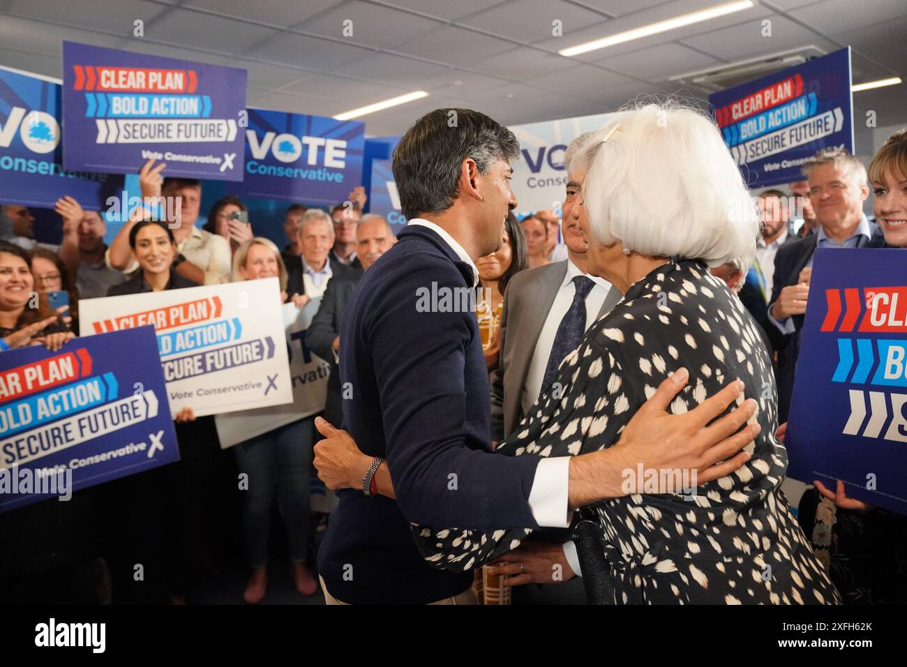 Prime Minister Rishi Sunak with his parents Yashvir and Usha Sunak, at ...