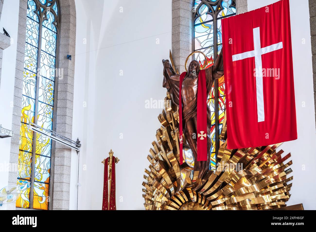altar with Jesus Christ and a cross in the interior of Christian ...