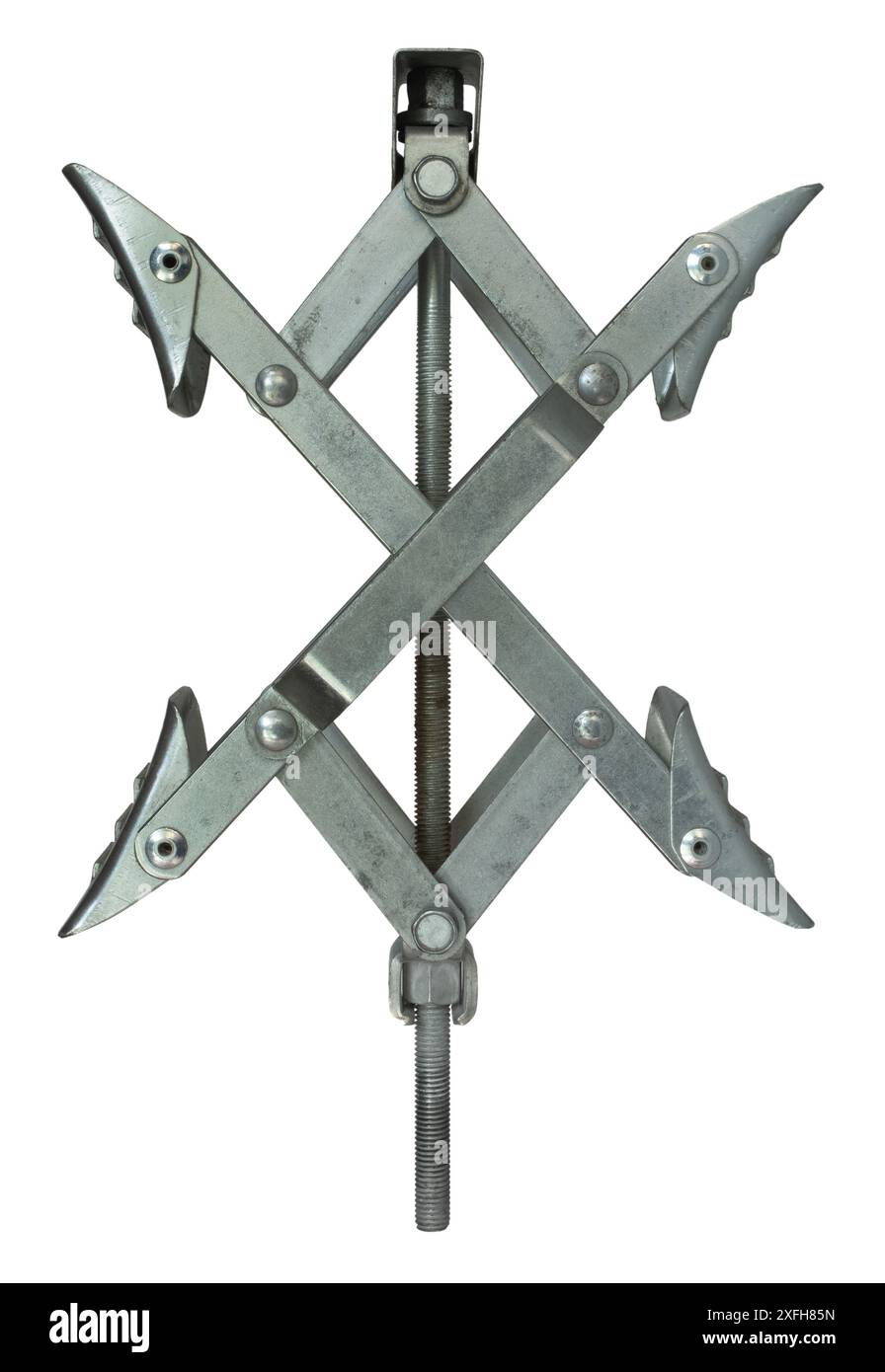 Metal chock that is X shapped that goes between tires on a tandem ...