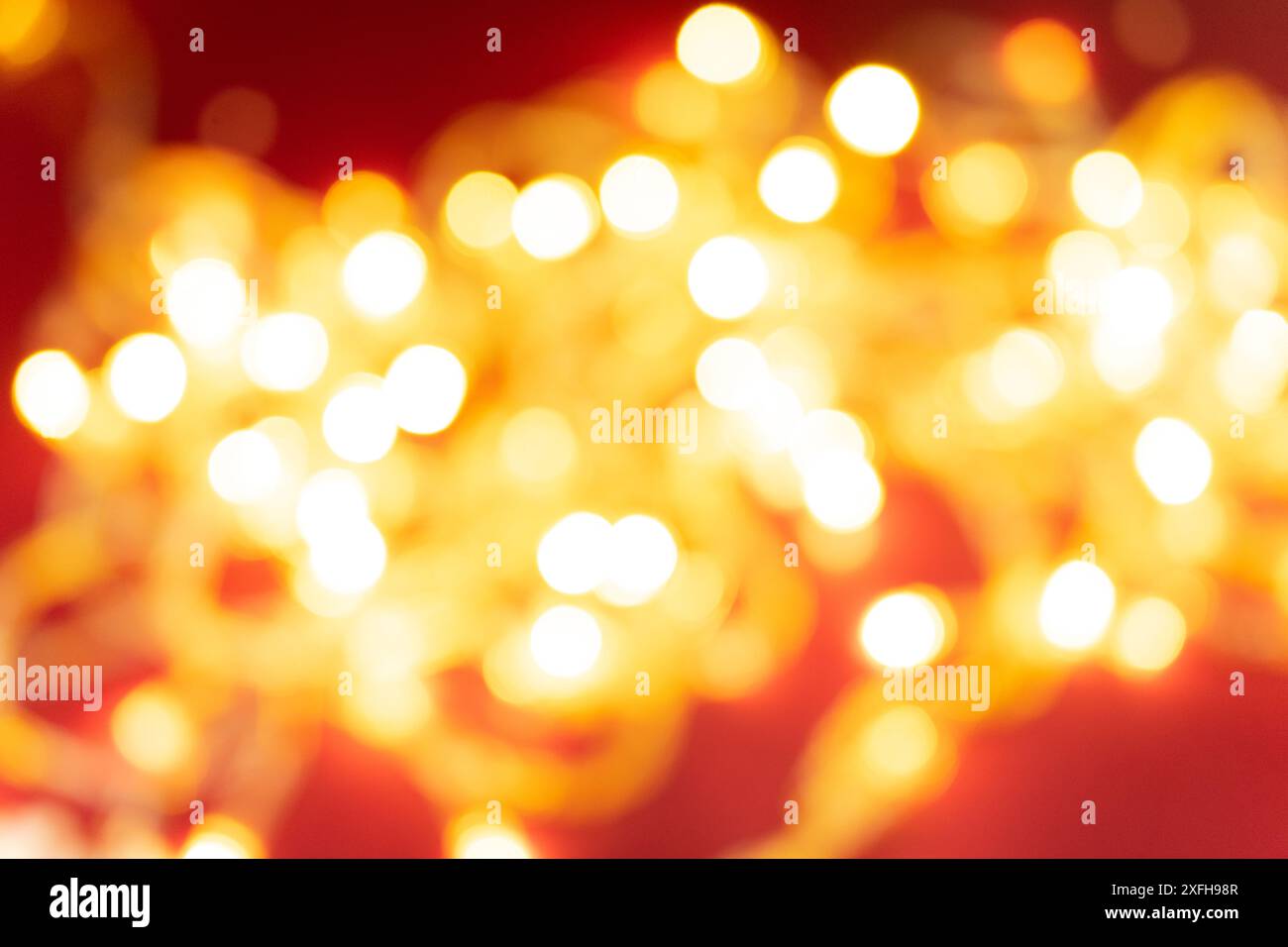 Bright red background. Background with festive bokeh Stock Photo - Alamy