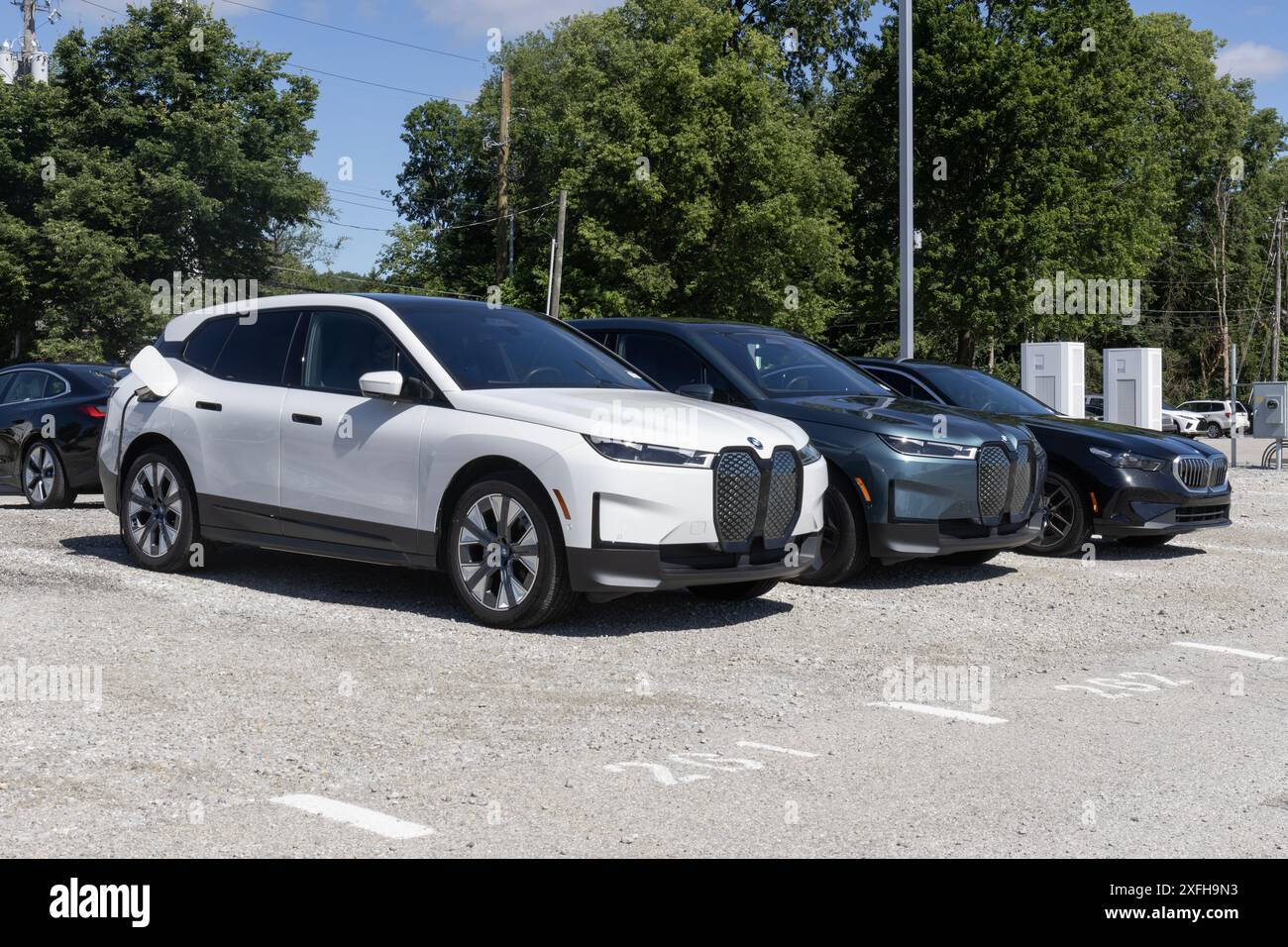 Indianapolis - June 30, 2024: BMW EV Electric Vehicles including an iX ...