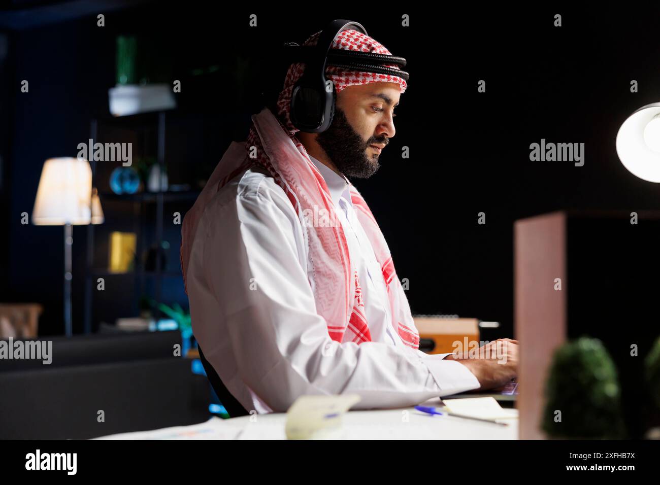 Professional attire attentively watches hi-res stock photography and ...