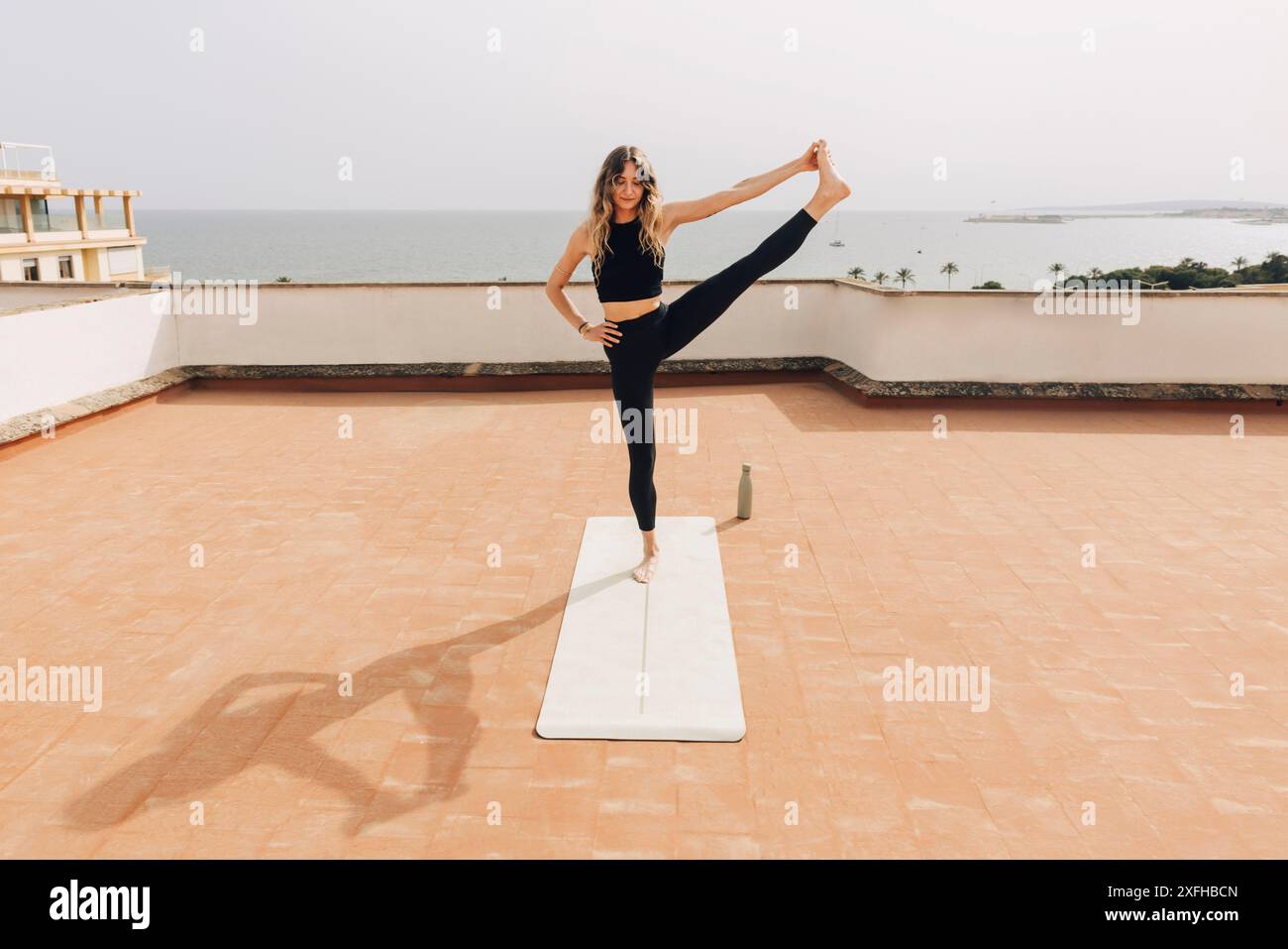 Standing hand to big toe pose hi-res stock photography and images - Alamy