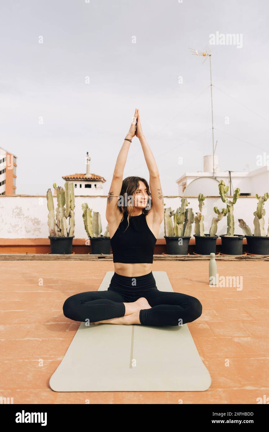 Young women practicing yoga on hi-res stock photography and images - Alamy