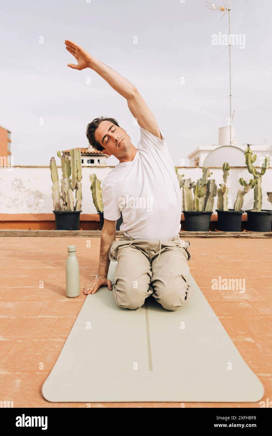 Man training stretching arm hi-res stock photography and images - Alamy