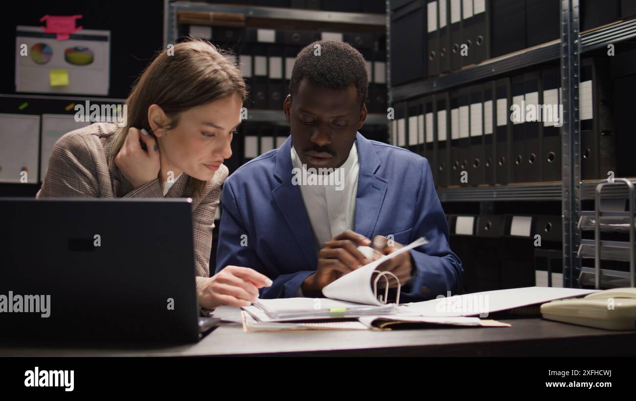 Multiethnic team of private detectives conducts a discreet inquiry ...