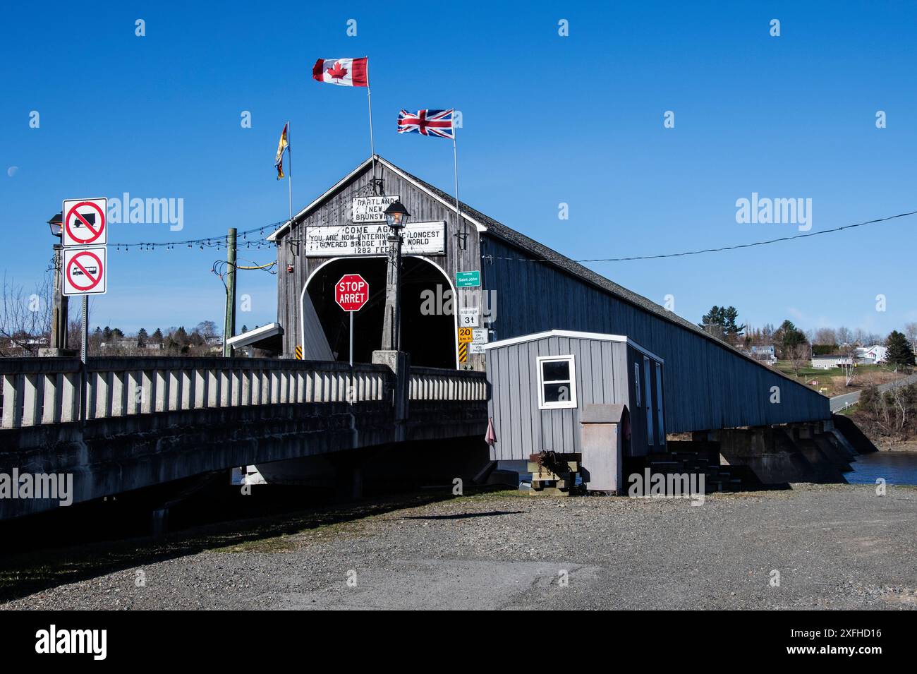 East entrance into the wooden covered bridge in Hartland, New Brunswick ...