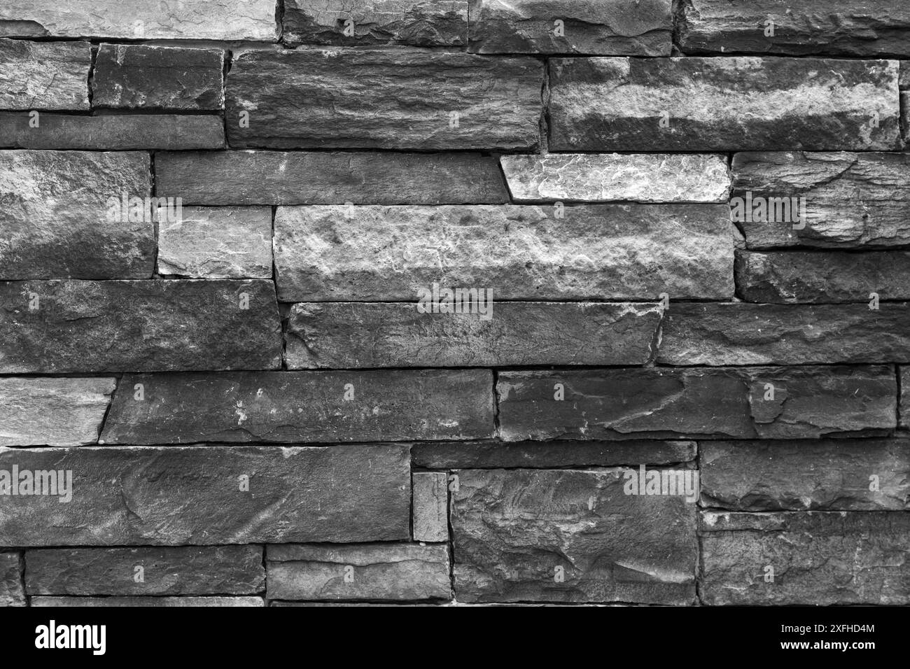 Black and white brick stone wall full frame background Stock Photo - Alamy