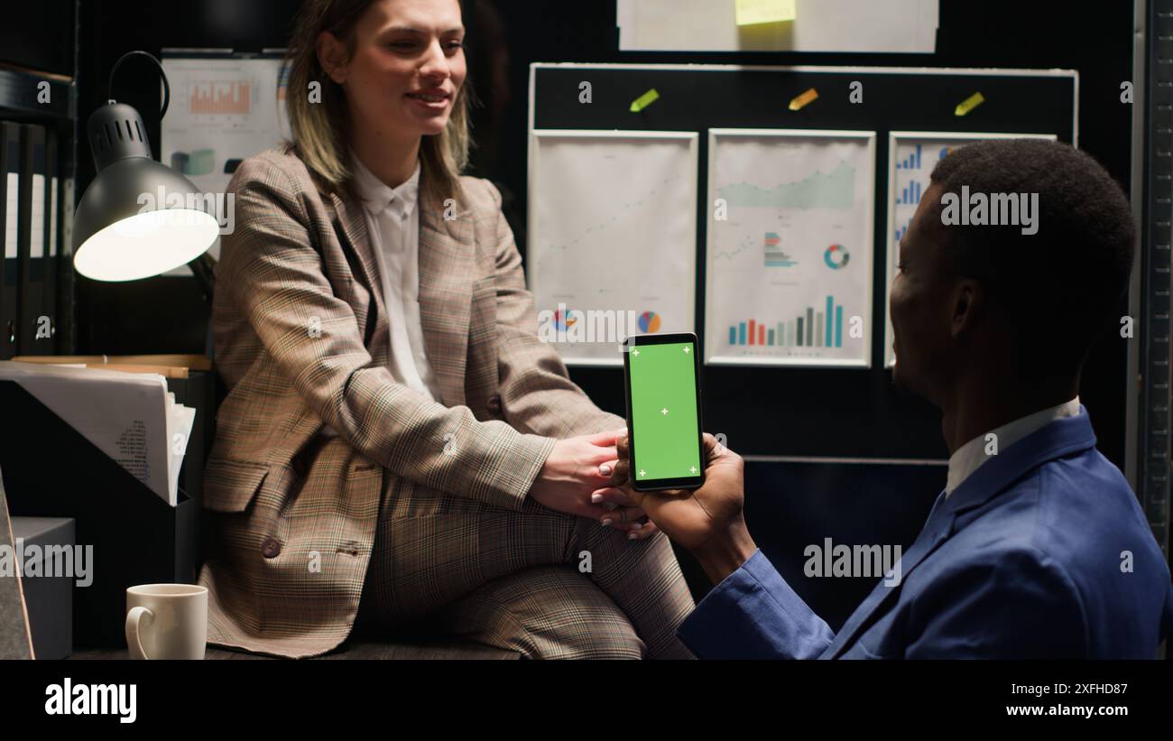 African american investigator conducts inquiry with caucasian officer ...