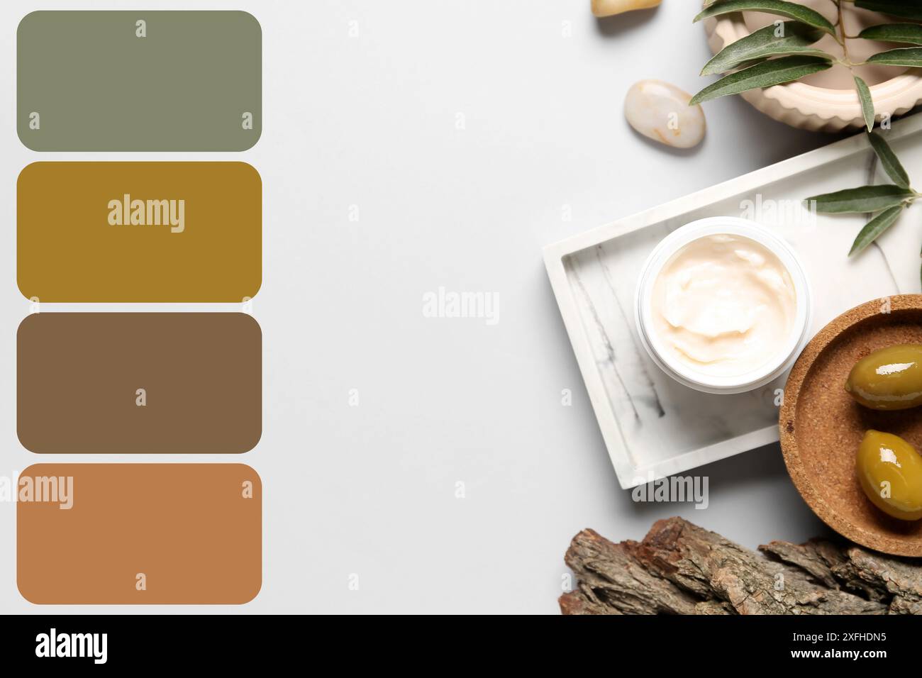 Jar of natural olive cream on light background. Different color ...