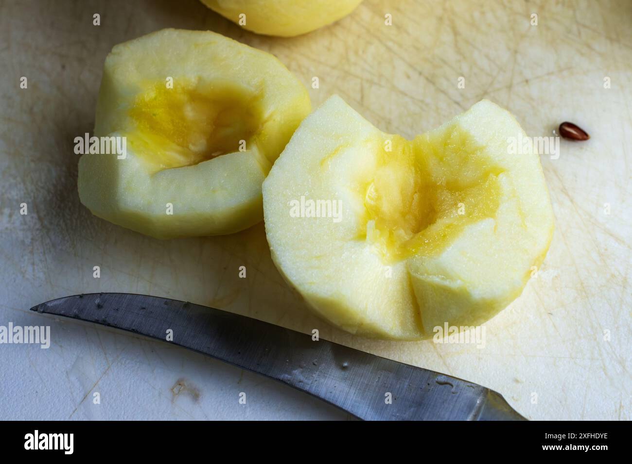 Gala apple cut in half with the core and seeds removed. Preparation for ...