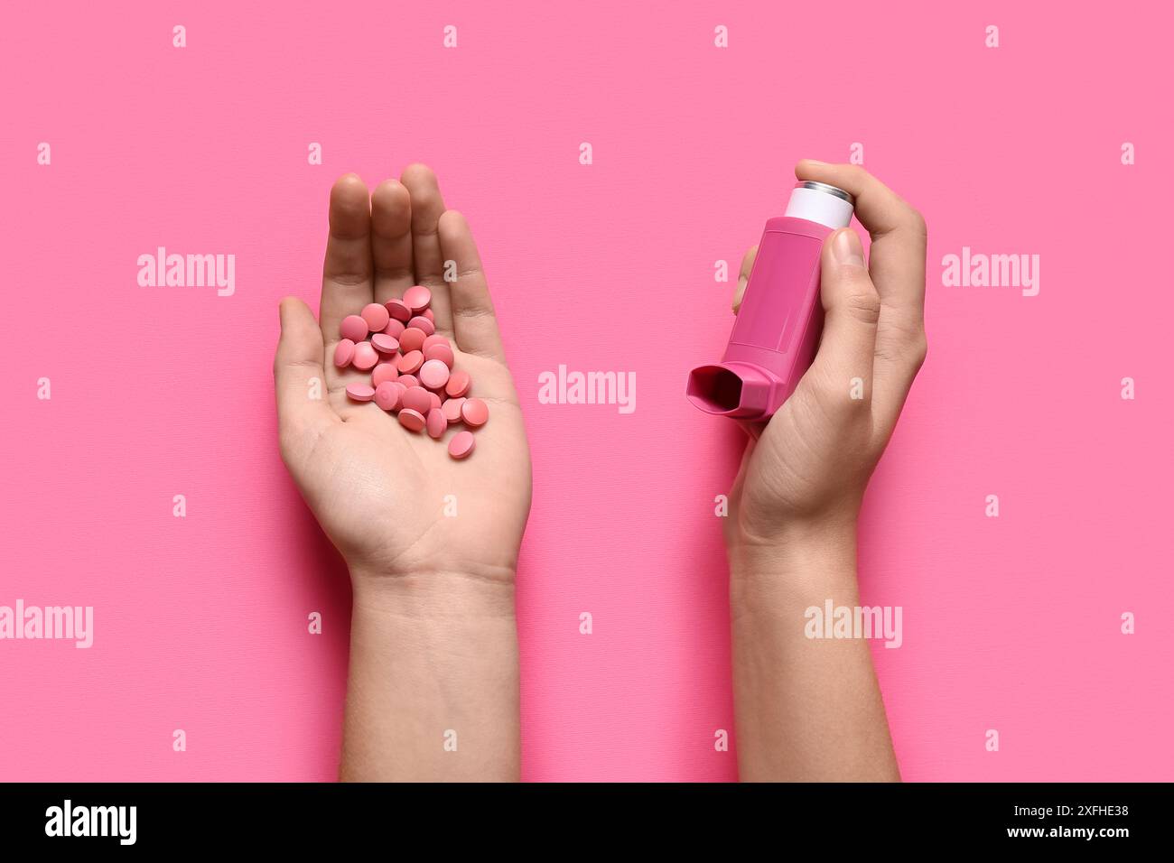Child's hands with asthma inhaler and pills on pink background Stock ...
