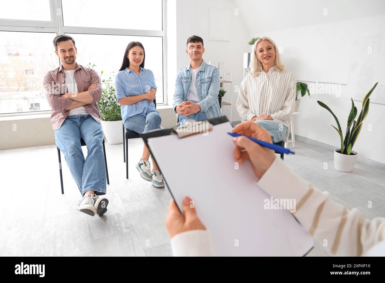 Group therapy people sitting chairs hi-res stock photography and images ...