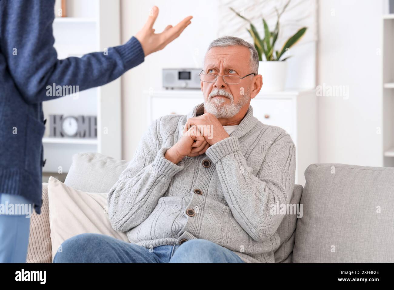 Female caregiver mistreating senior man in nursing home Stock Photo - Alamy