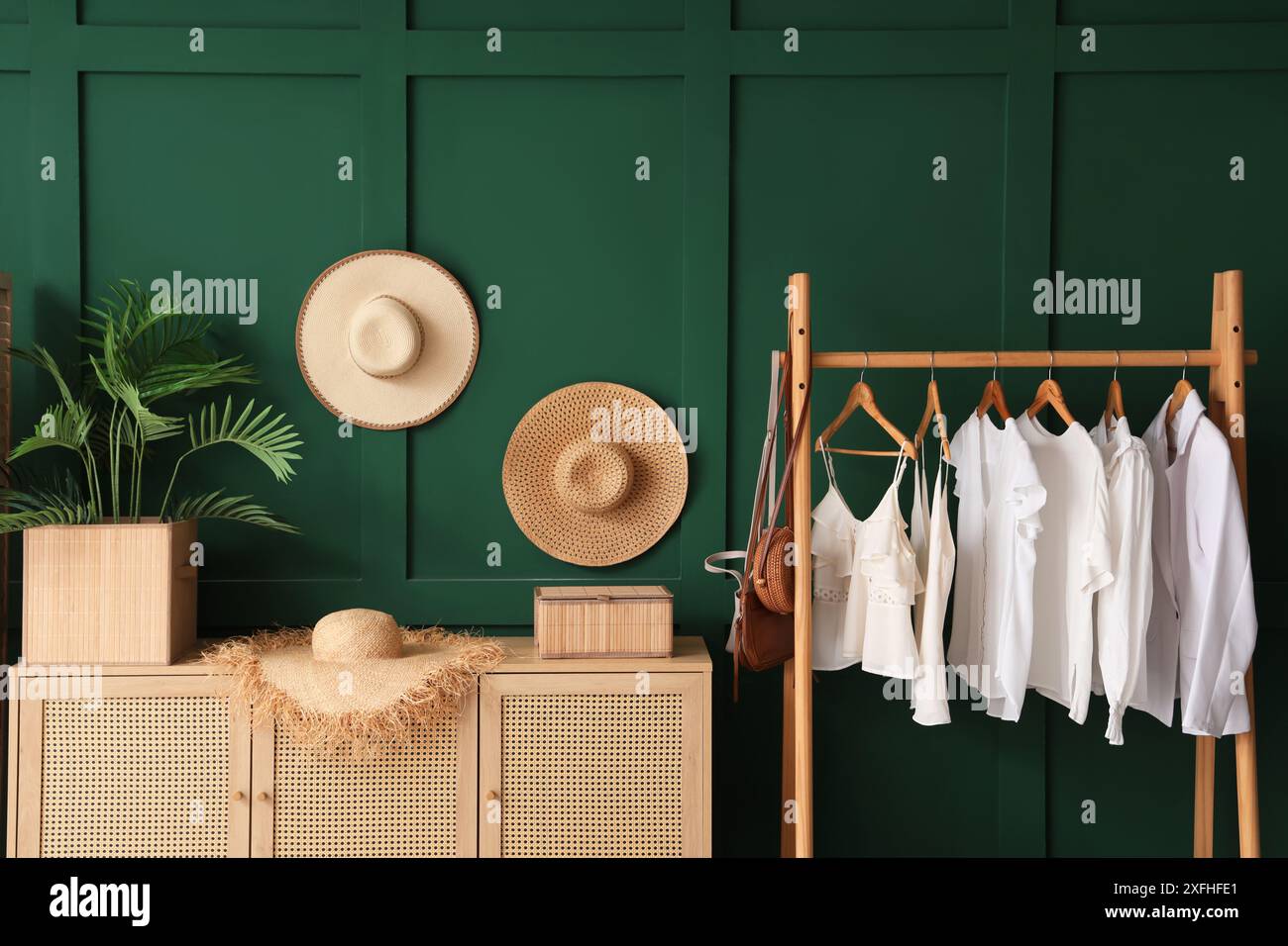 Interior of hall with commode, hats and clothes rack Stock Photo - Alamy