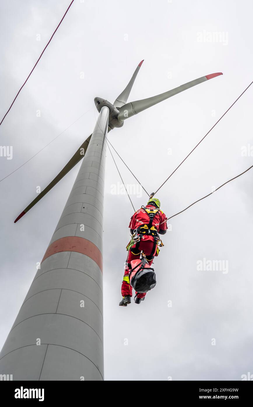 Height rescuers from the Oberhausen fire department practise abseiling ...