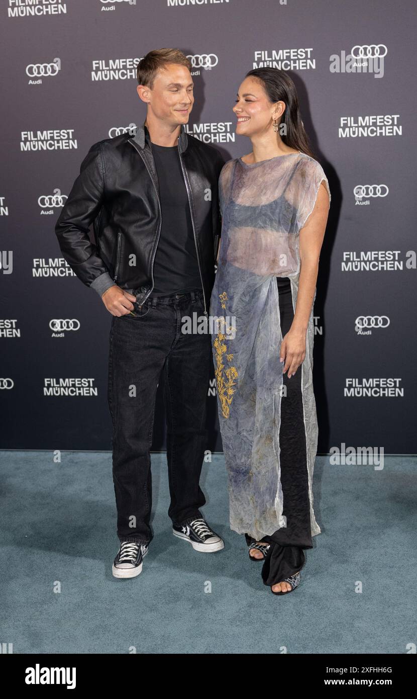 Munich, Germany. 03rd July, 2024. Dennis Mojen, Janina Uhse at the ...