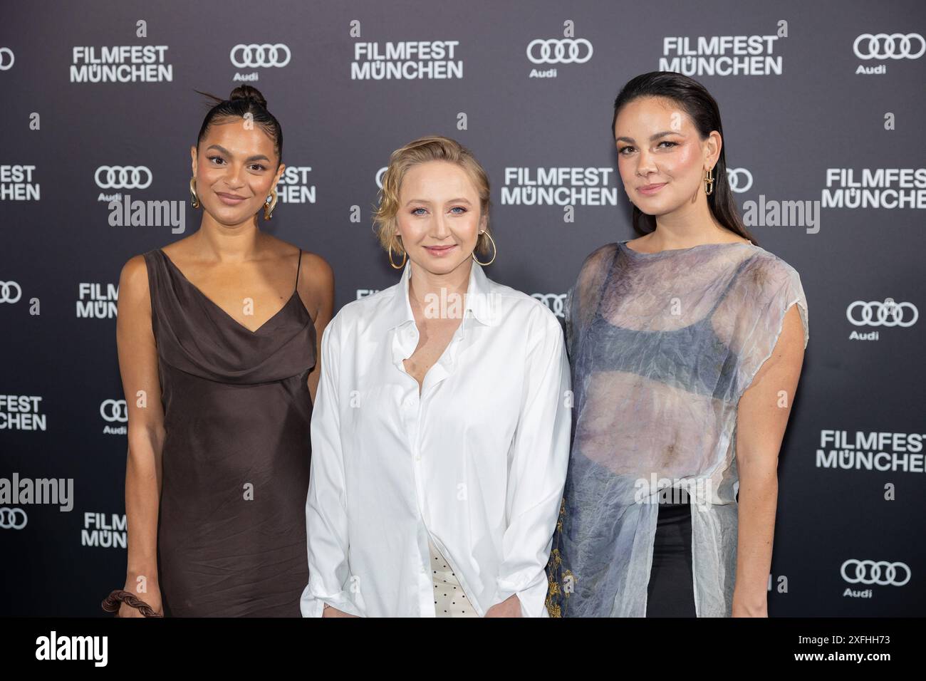 Munich, Germany. 03rd July, 2024. Taneshia Abt, Janina Uhse, Anna Maria Mühe at the premiere of ...