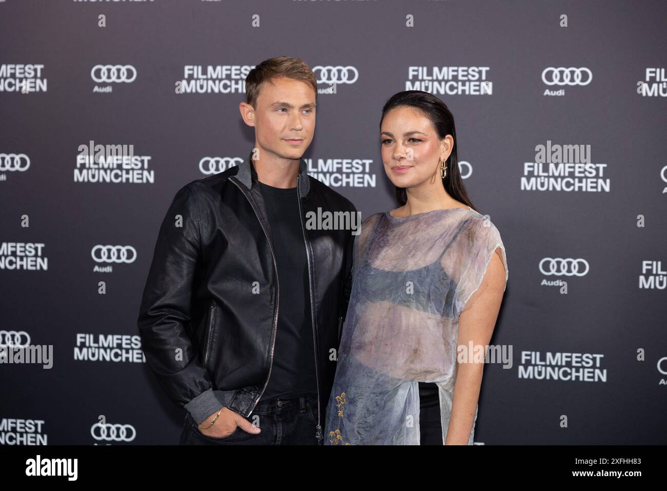 Munich, Germany. 03rd July, 2024. Dennis Mojen, Janina Uhse at the ...