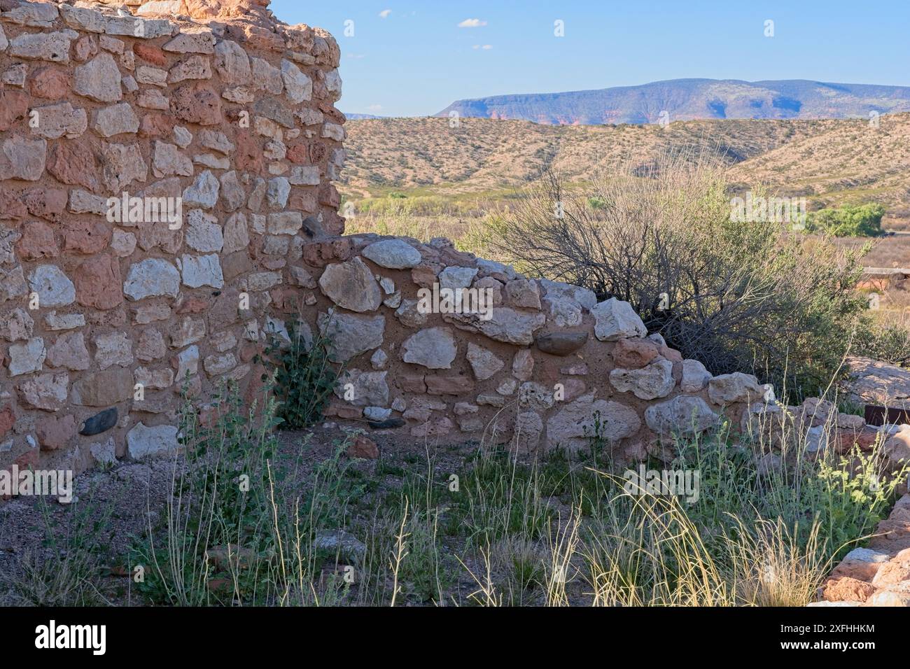 Masonry walls of Tuzigoot pueblo ruins overlooking verde river valley ...
