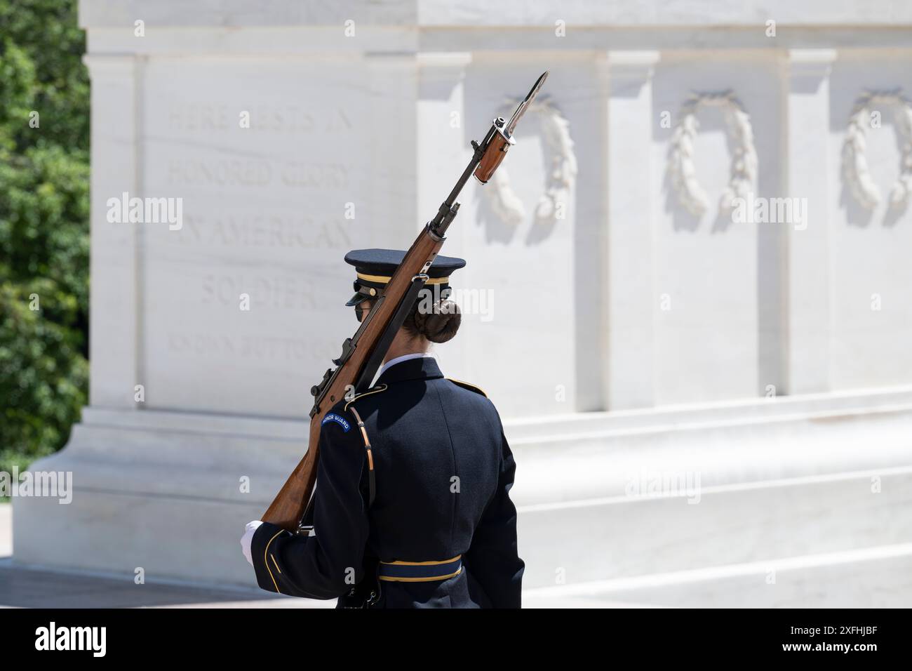 A sentinel from the 3d U.S. Infantry Regiment (The Old Guard) walks the ...