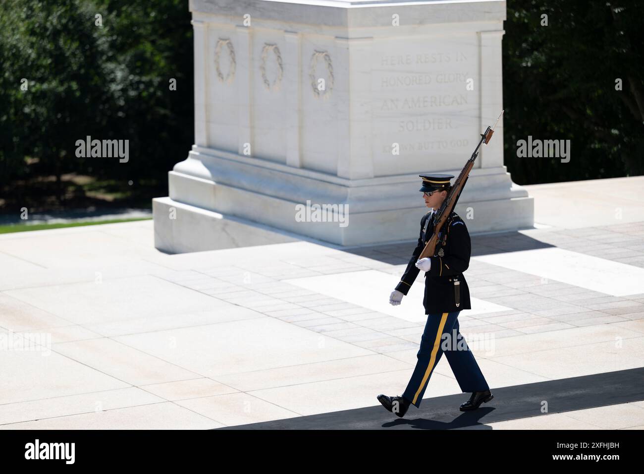A sentinel from the 3d U.S. Infantry Regiment (The Old Guard) walks the ...
