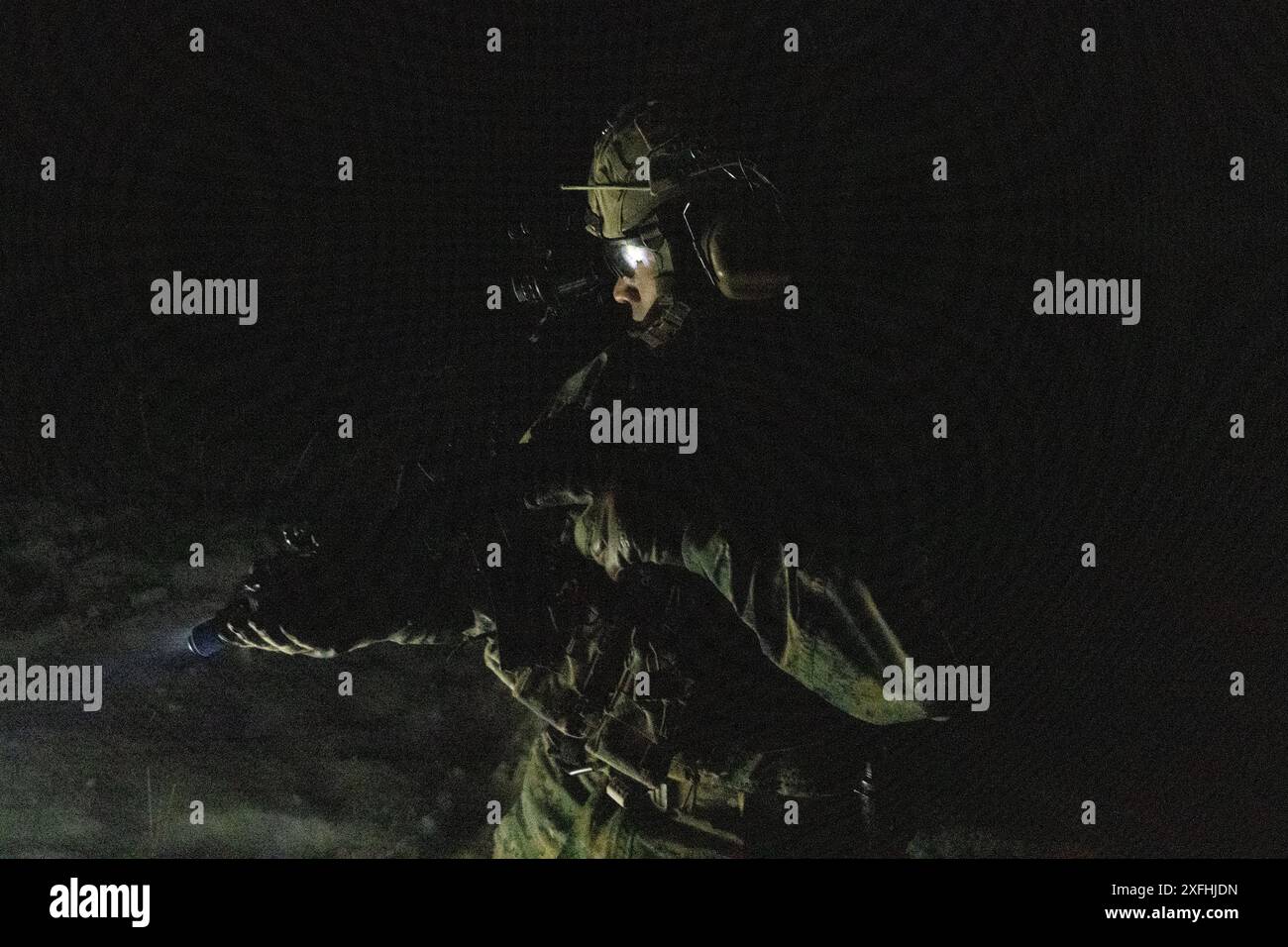 A Member of the Ejercito de Chile (Chilean Army) detains an ...