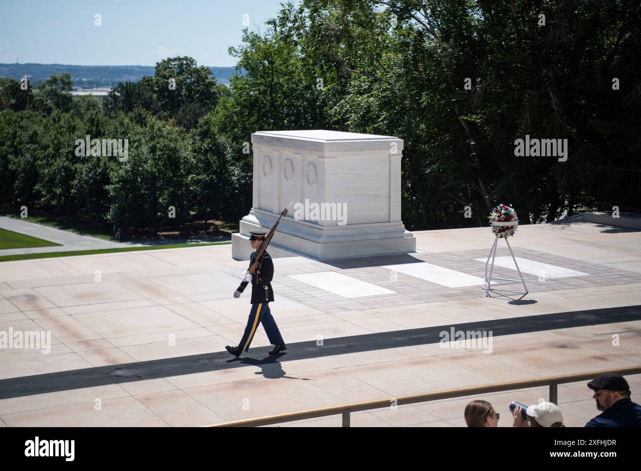 A sentinel from the 3d U.S. Infantry Regiment (The Old Guard) walks the ...