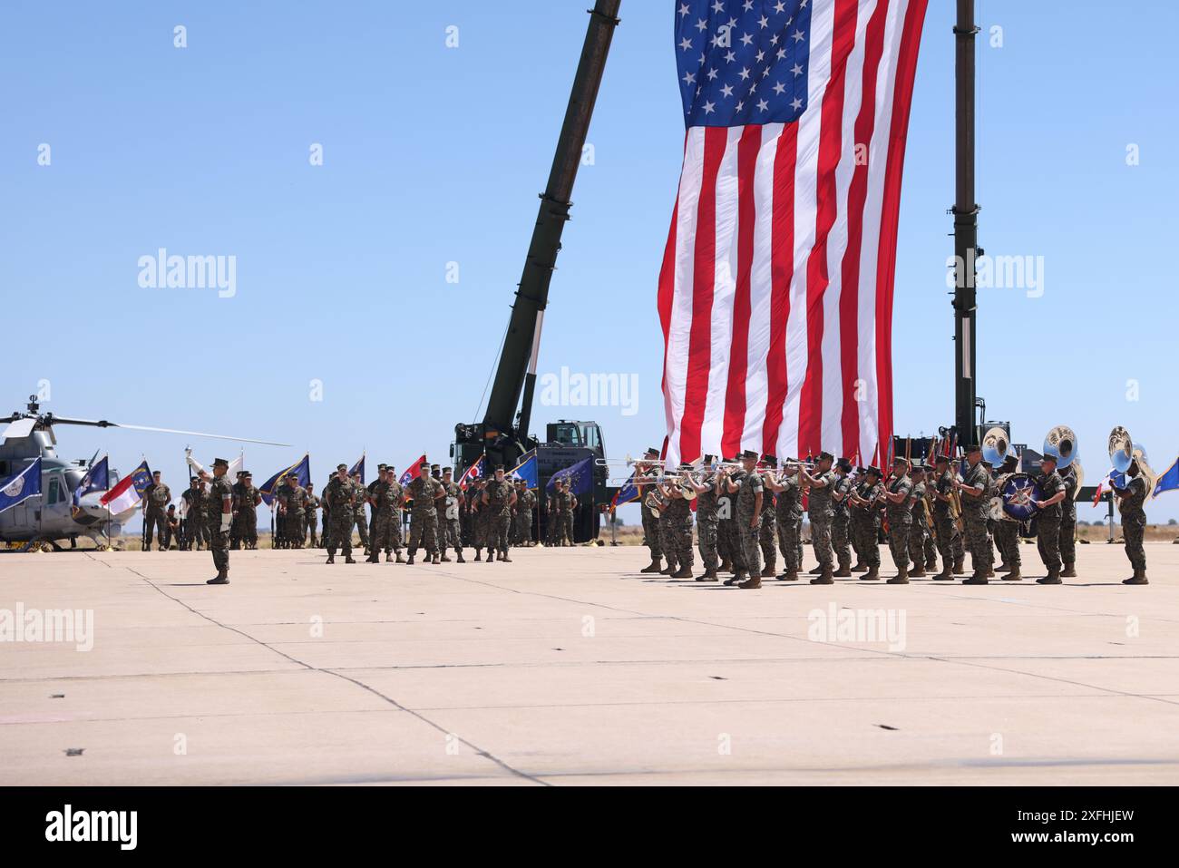 U.S. Marines with the 3rd Marine Aircraft Wing Band and 3rd MAW stand ...