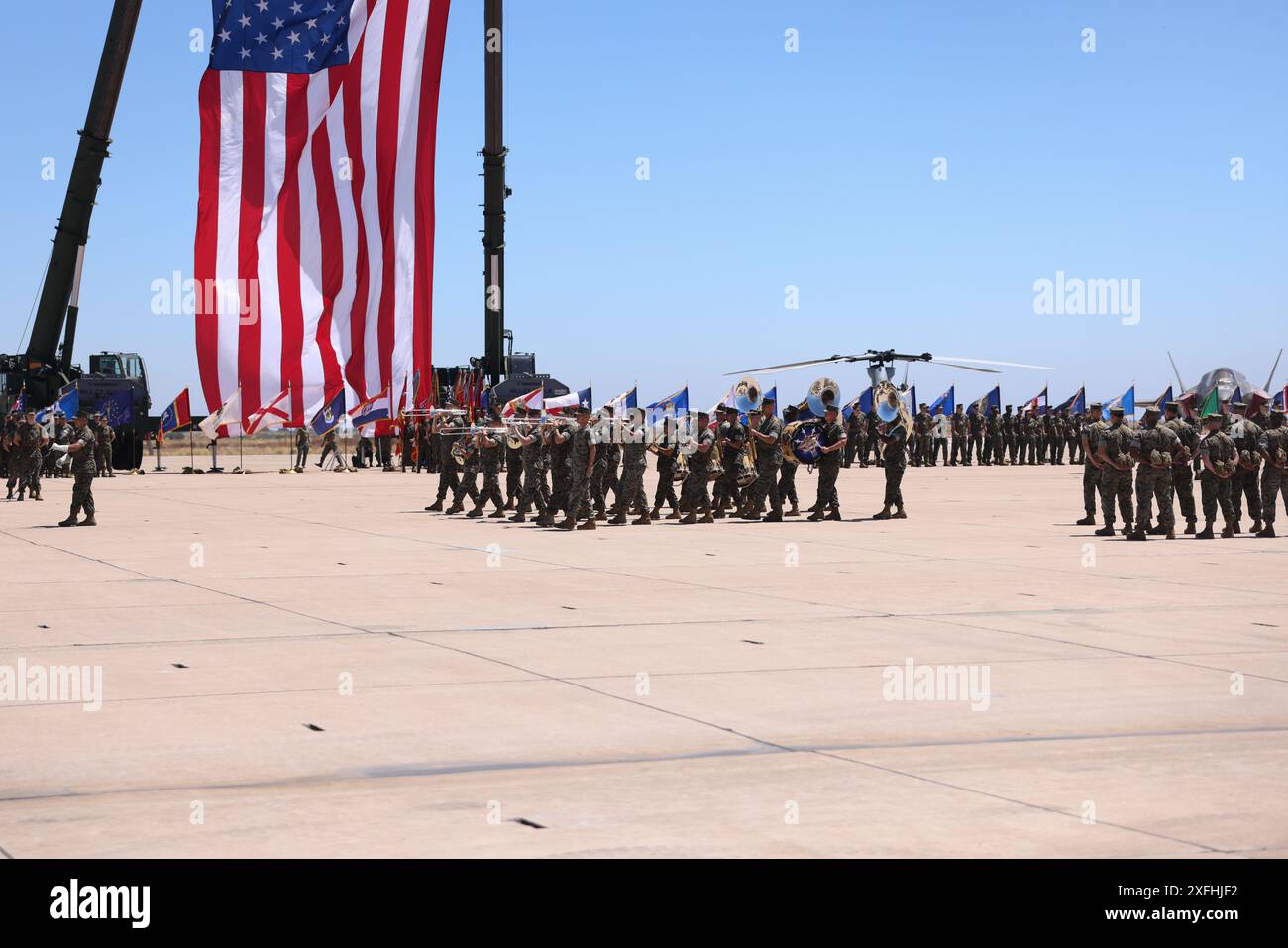 U.S. Marines with the 3rd Marine Aircraft Wing Band and 3rd MAW stand ...