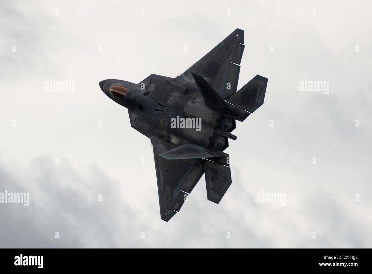 A U.S. Air Force F-22 Raptor assigned to the 3rd Wing flies over Joint ...