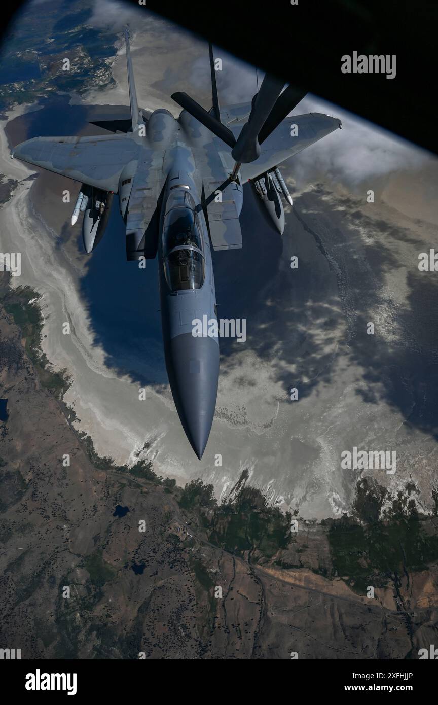 An F-15 Eagle assigned to the 142nd Fighter Wing receives fuel from a ...