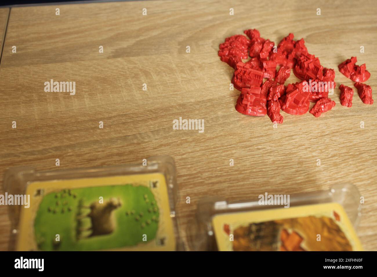 Mozyr, Belarus, April 10 2024: Red Meeple Game Elements for Catan Board ...