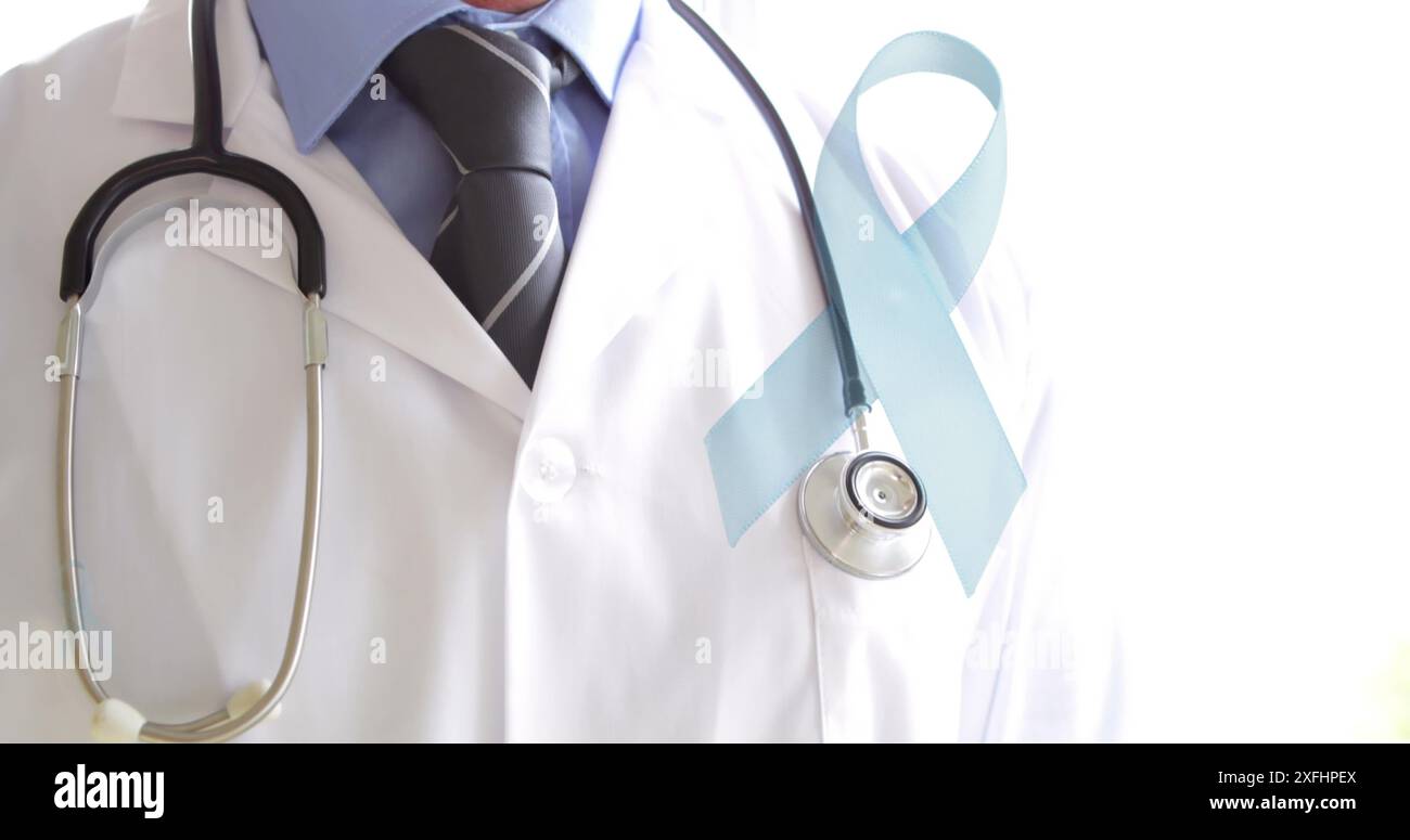 Image of blue cancer ribbons over male doctor on white background Stock ...