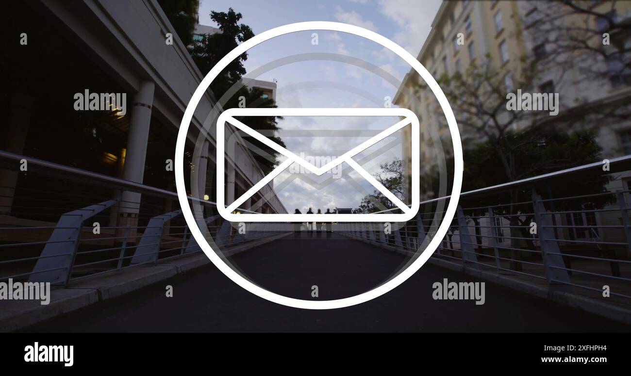 Image of envelope icon over people walking on street Stock Photo - Alamy