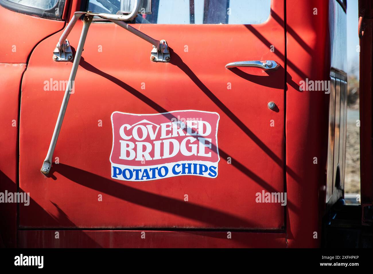 Covered Bridge Potato Chips sign on a red truck on Alwright Court in ...