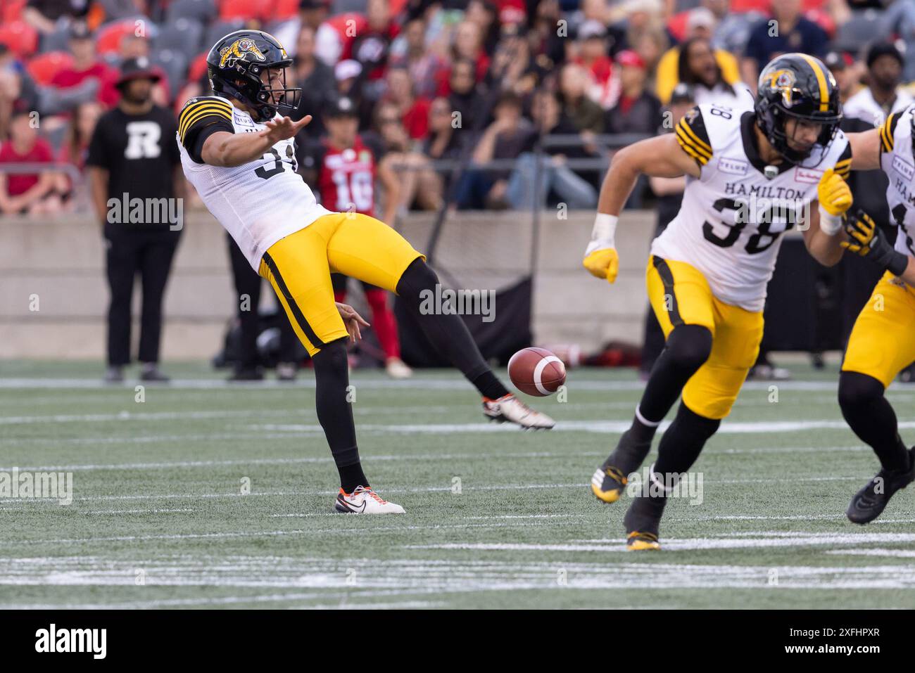 Ottawa, Canada. 30th June, 2024. Hamilton Tiger-Cats punter Nik ...