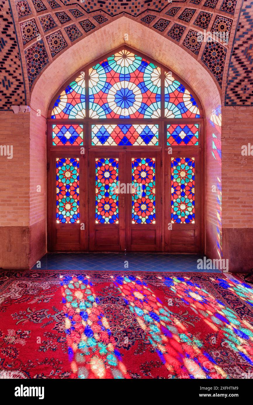 Scenic view of morning sunlight reflected through colorful stained ...