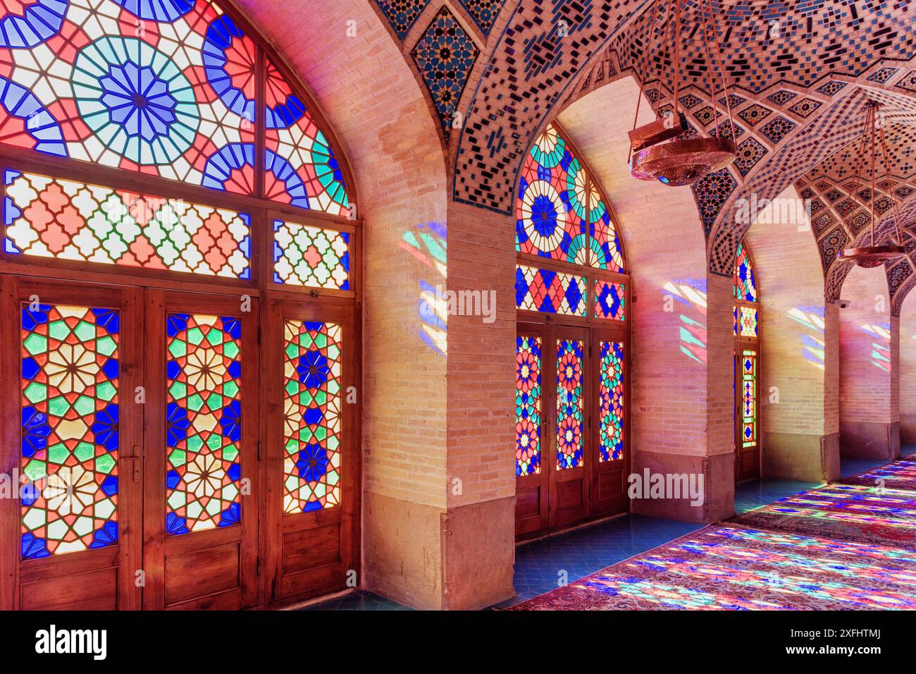 Scenic view of morning sunlight reflected through colorful stained ...