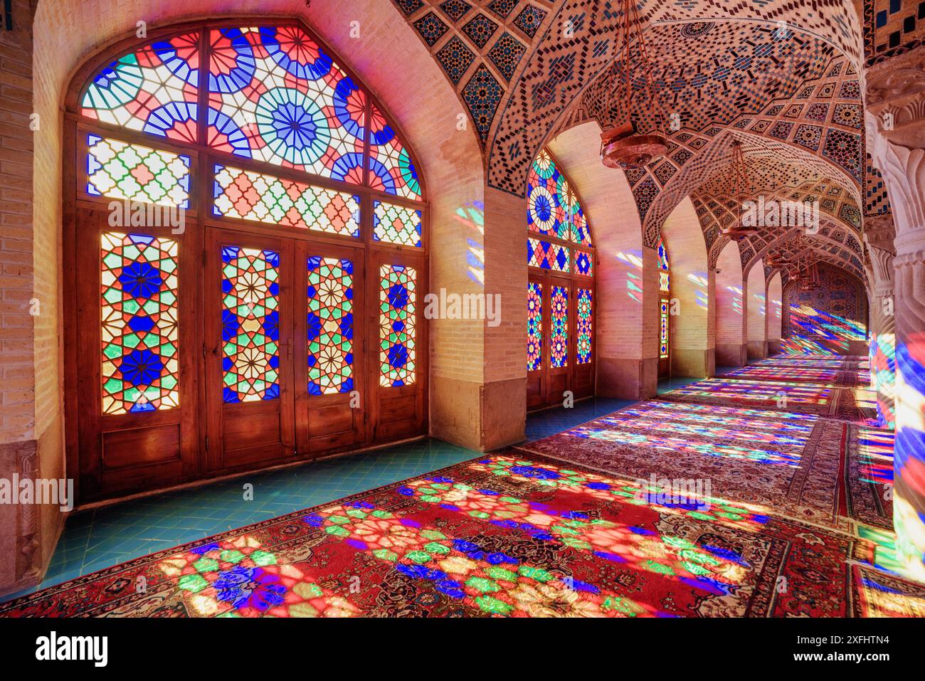 Scenic view of morning sunlight reflected through colorful stained ...